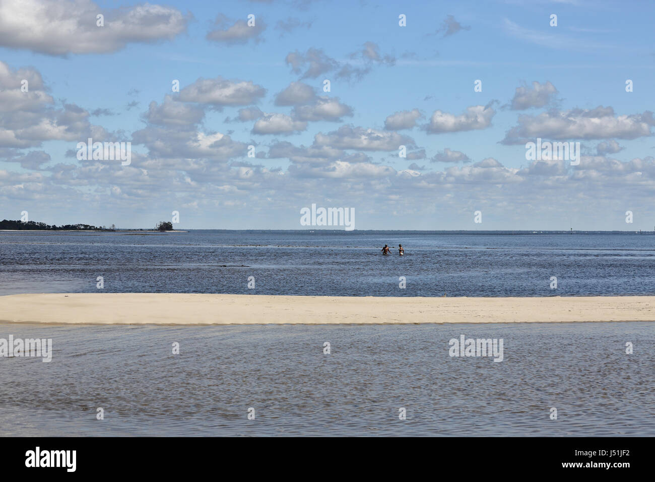 Shallow sandy ocean coastline with a sandbar off the Gulf of Mexico ...