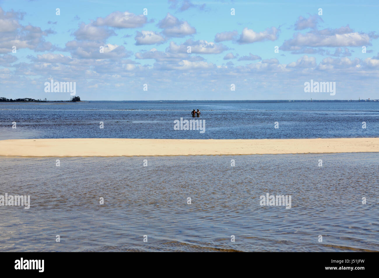 Shallow sandy ocean coastline with a sandbar off the Gulf of Mexico ...