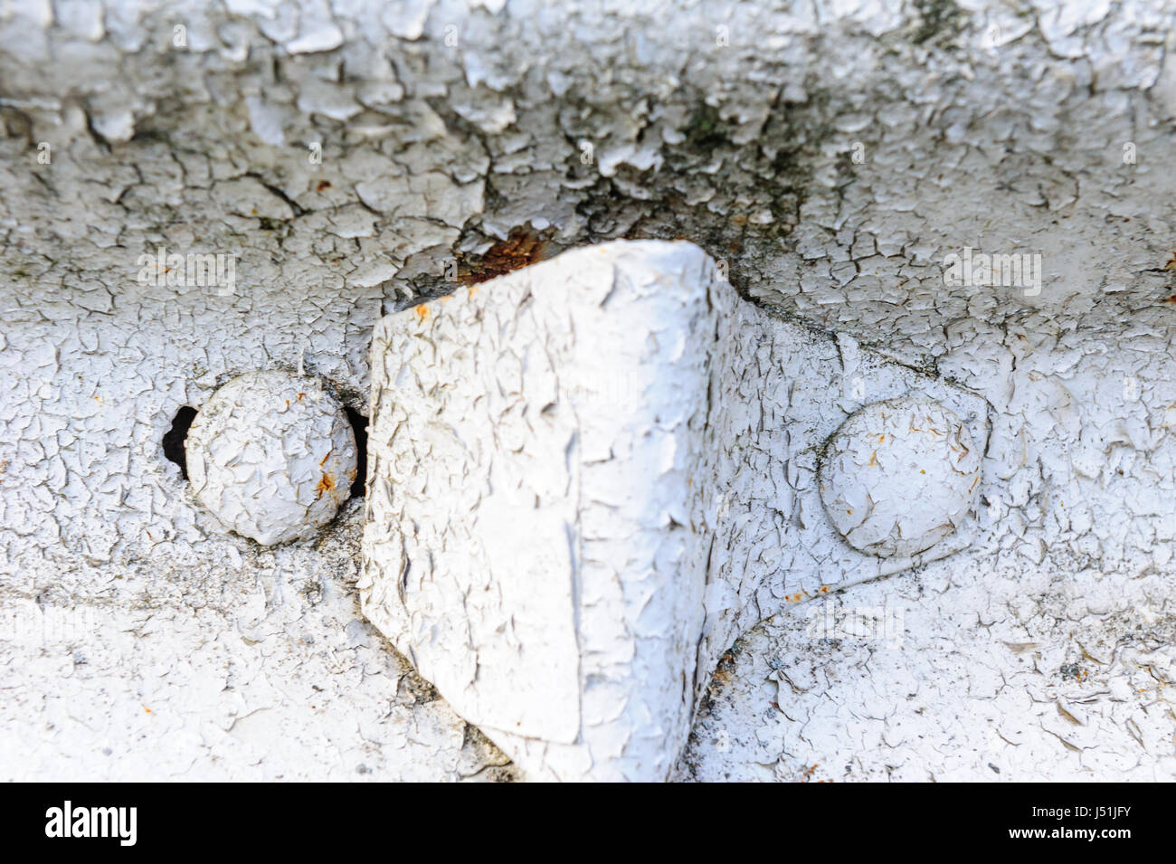 metal surface with old paint, some visible damage, as well as metal ...