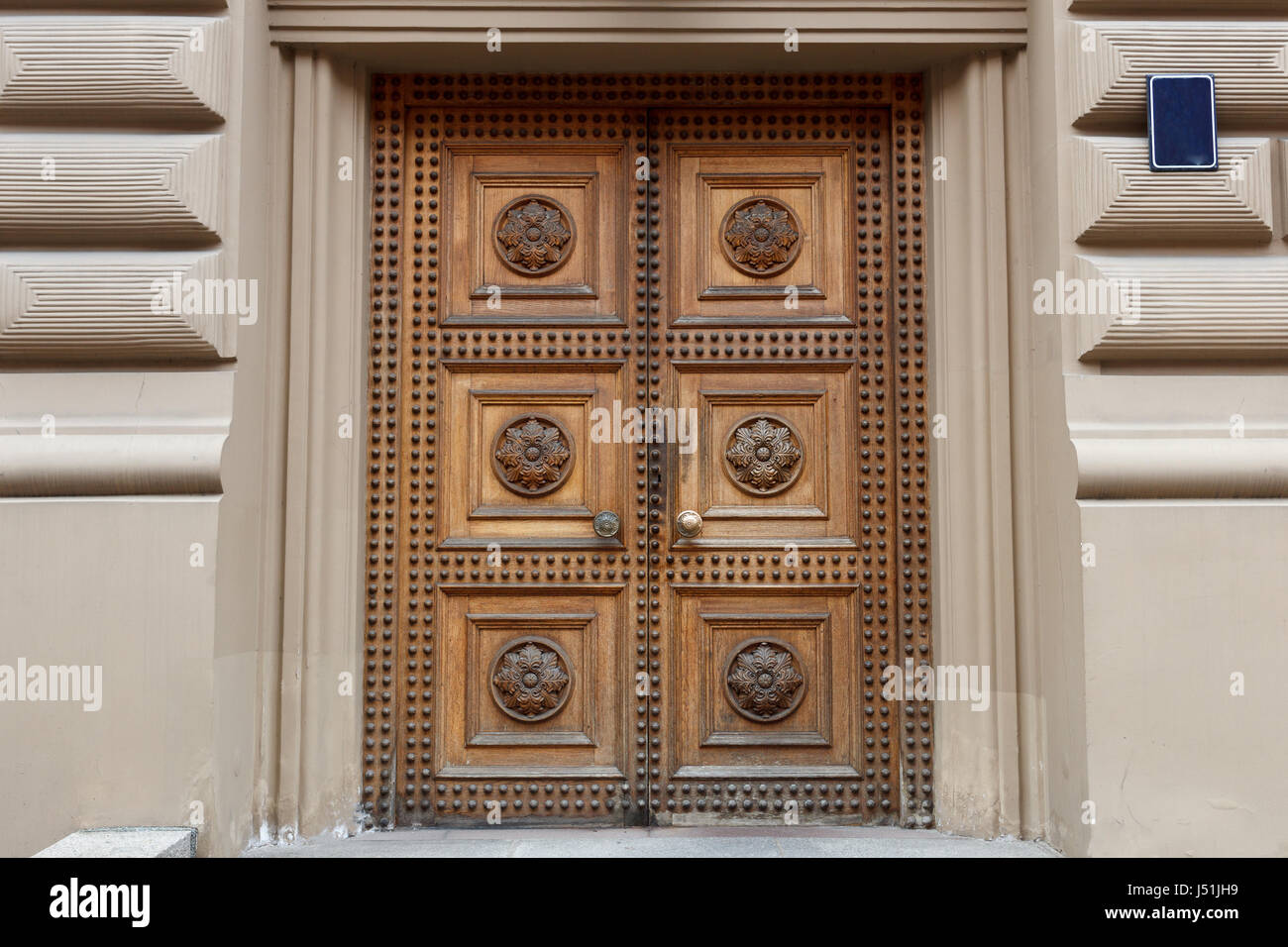 A fancy wooden door of an Art Nouveau building Stock Photo - Alamy