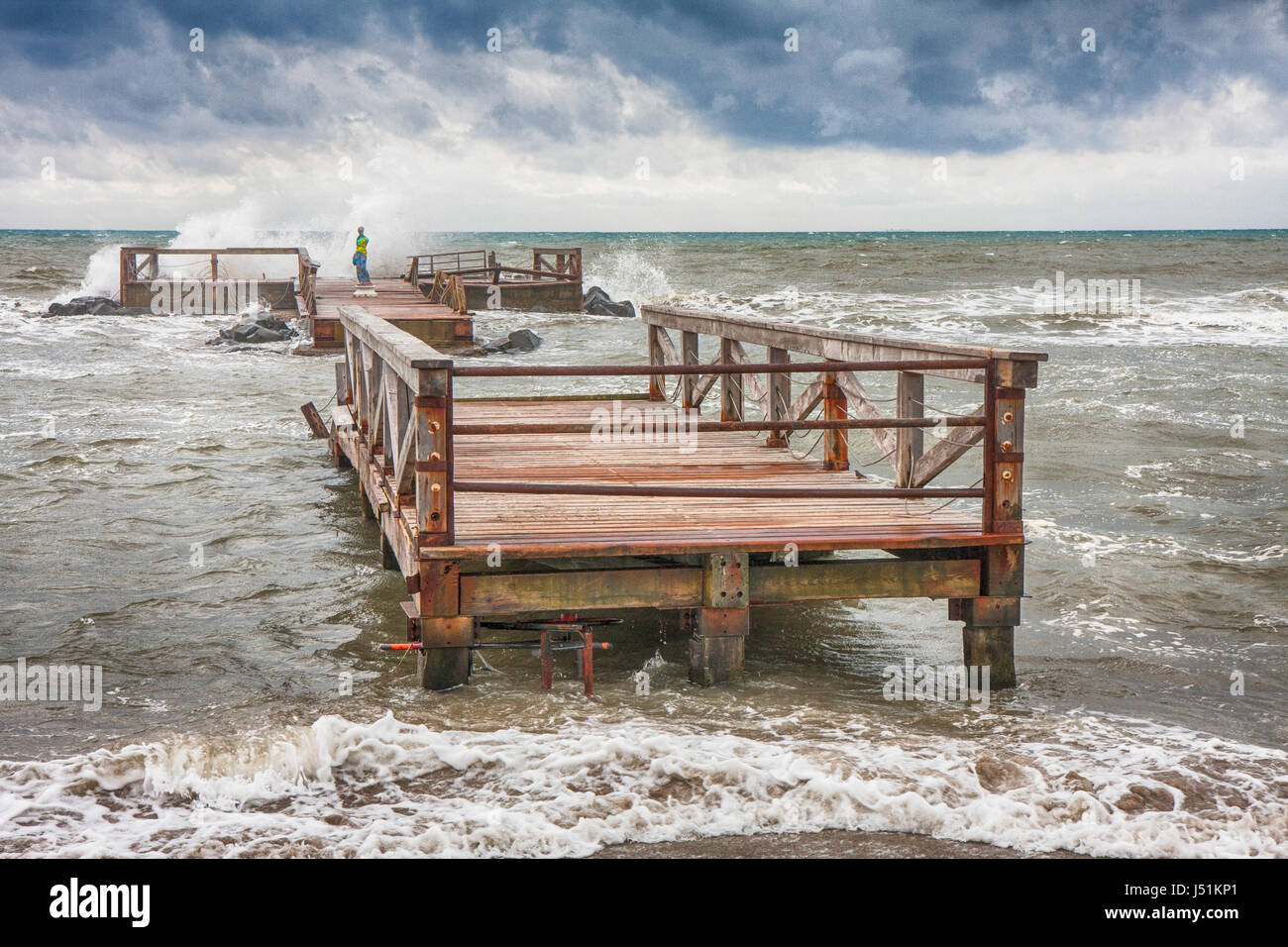 Rome, Italy - November 10, 2014: A wooden bridge near the shore of the ...