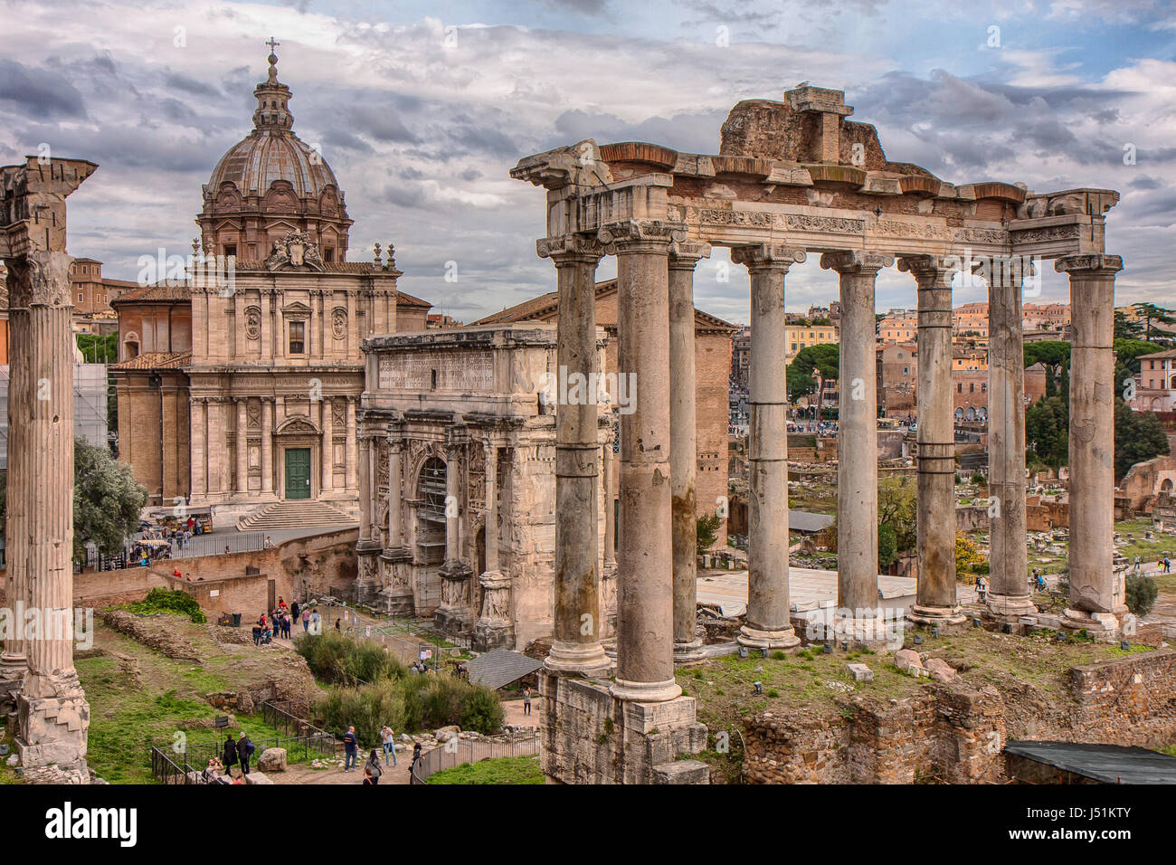 Rome, Italy - November 10, 2014: The Temple of Saturn and the church of ...