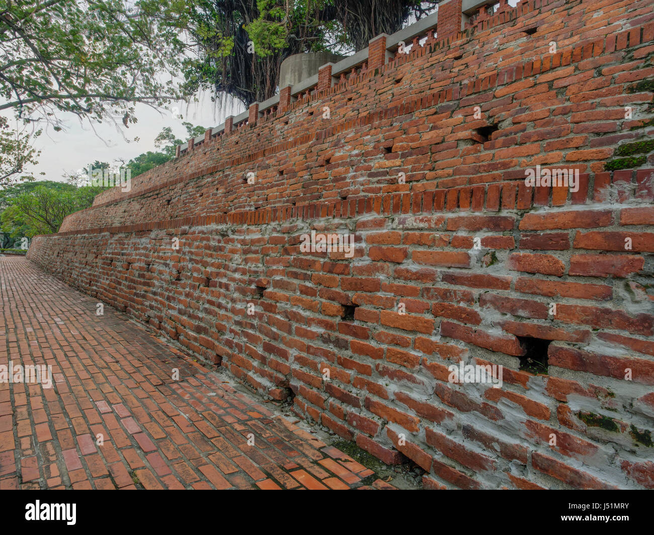 Tainan, Taiwan - October 10, 2016: Old brick walls around the tower in ...
