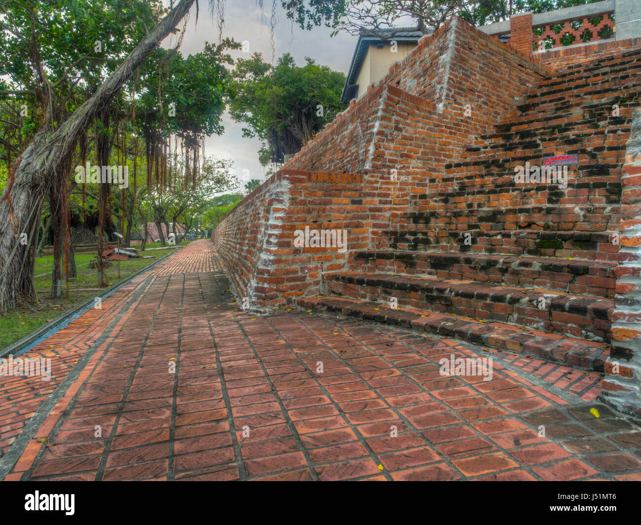 Tainan, Taiwan - October 10, 2016: Old brick walls around the tower in ...