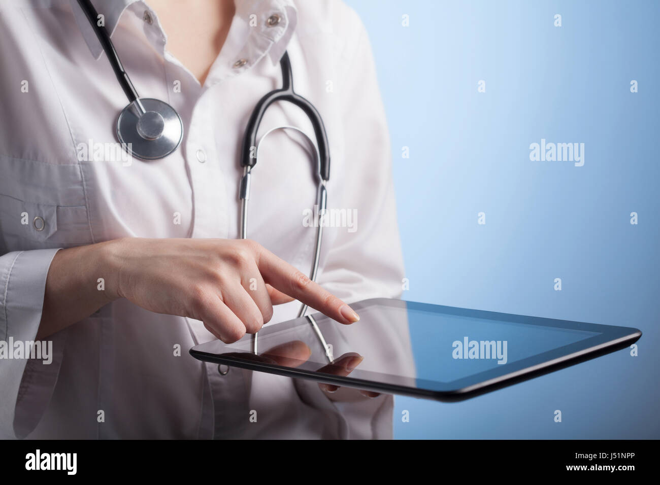Doctor ipad health medical clinic worker modern Stock Photo - Alamy