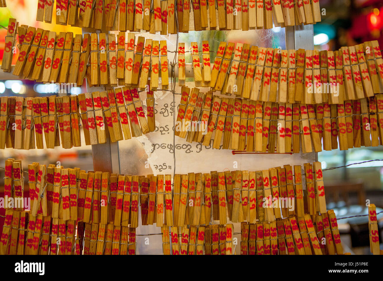 A Chinese restaurant uses painted clothes pins to mark customers' food ...