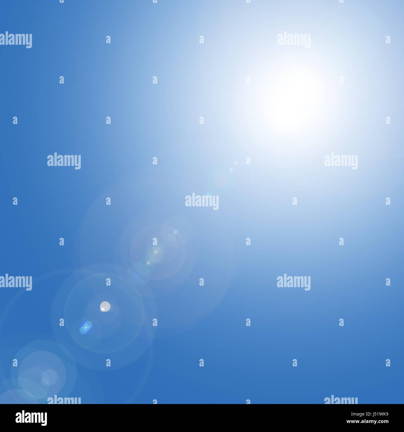 Sun in the blue sky Stock Photo - Alamy