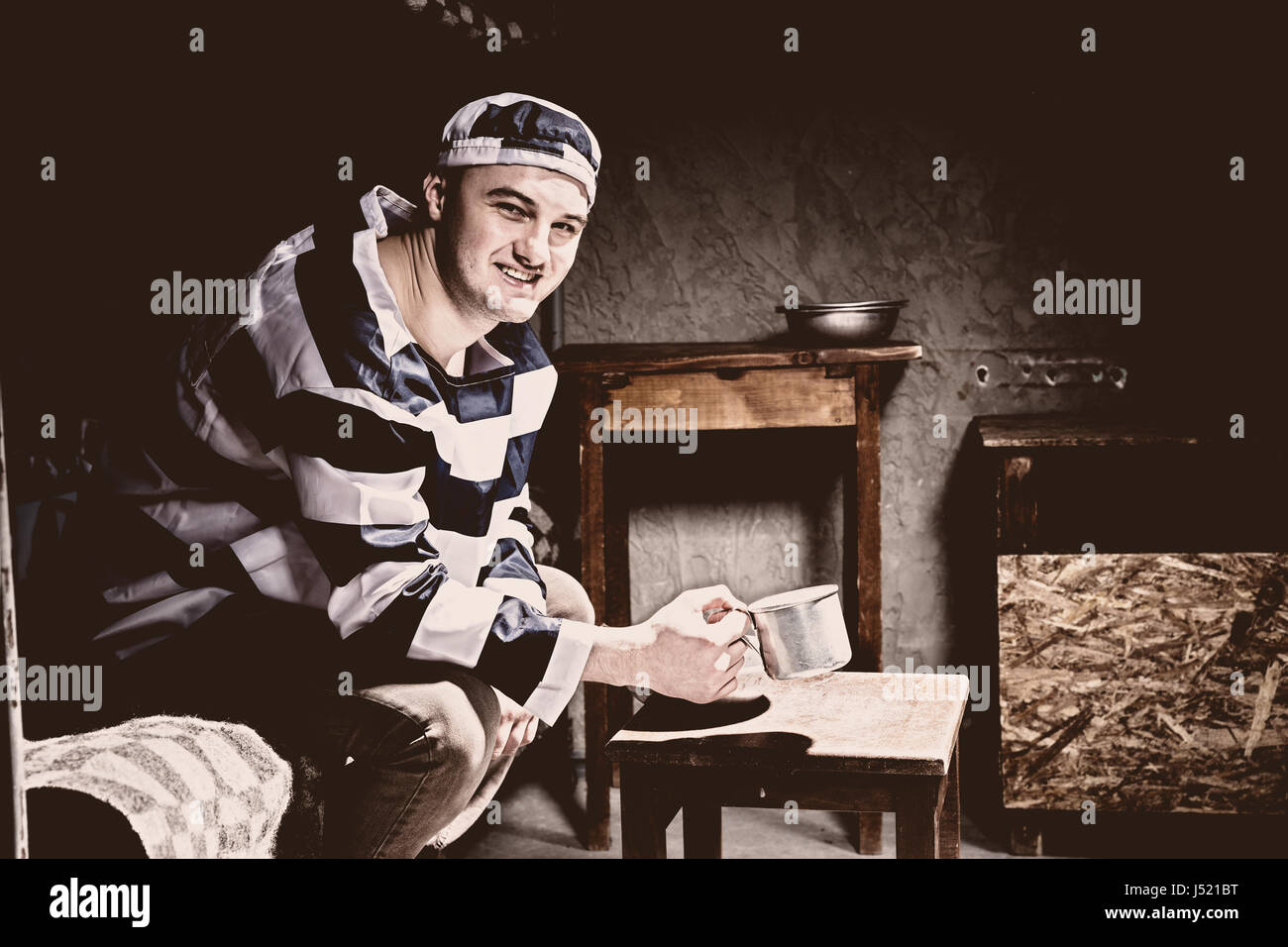 Male inmate inside cell hi-res stock photography and images - Alamy