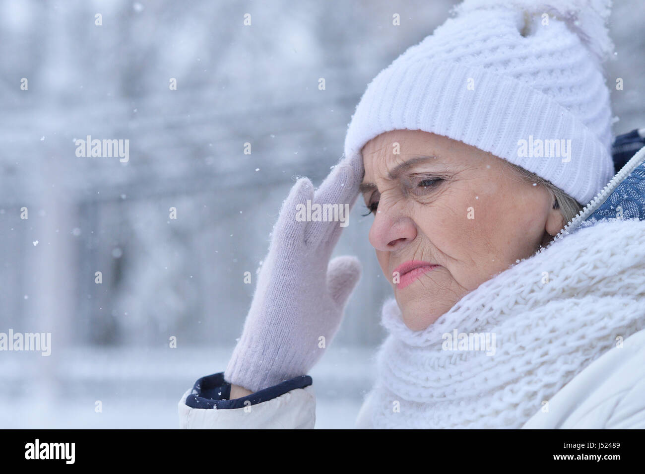 Senior woman in frosty winter Stock Photo - Alamy