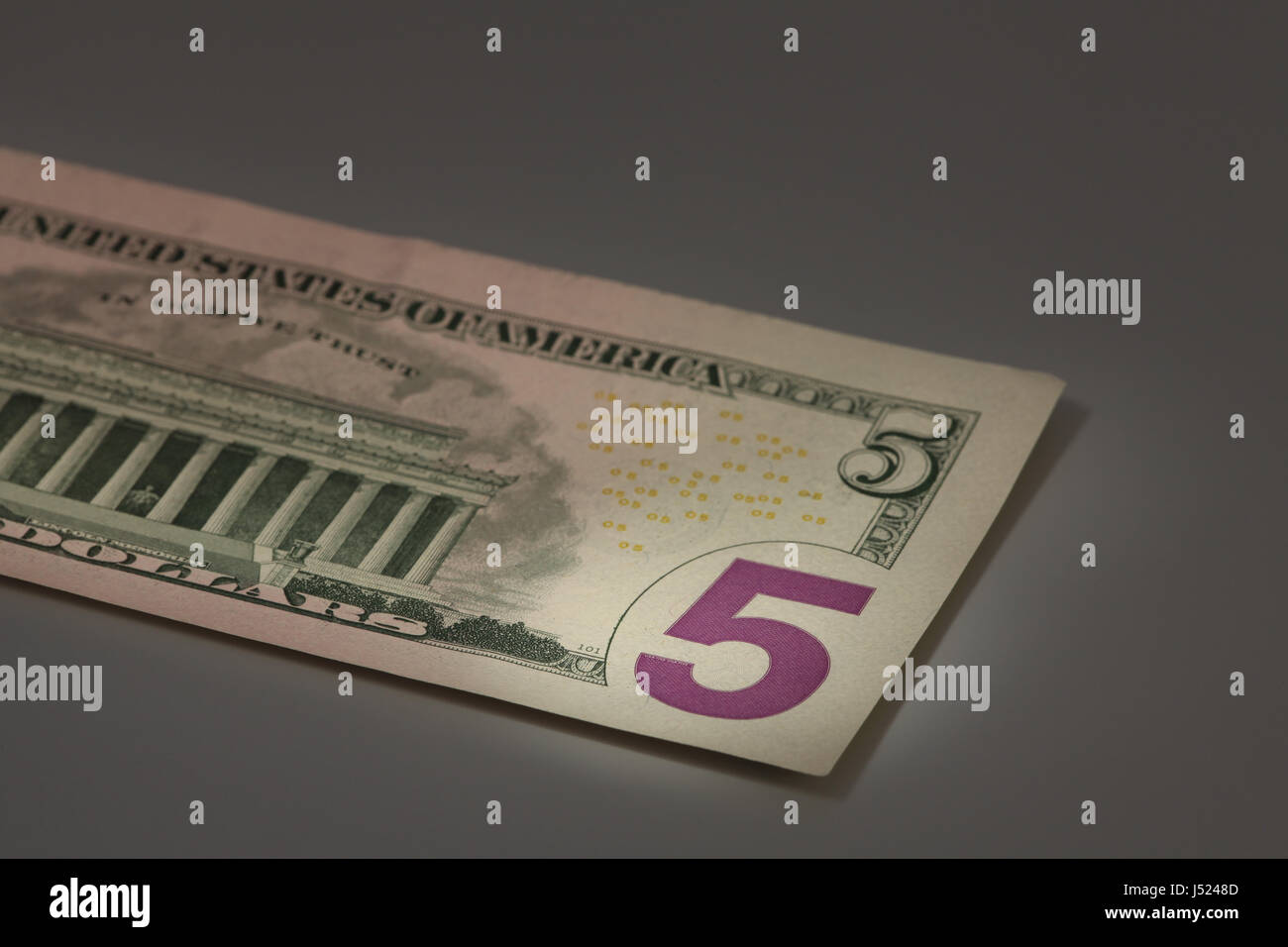 number 5 on american dollar bill macro shot Stock Photo - Alamy