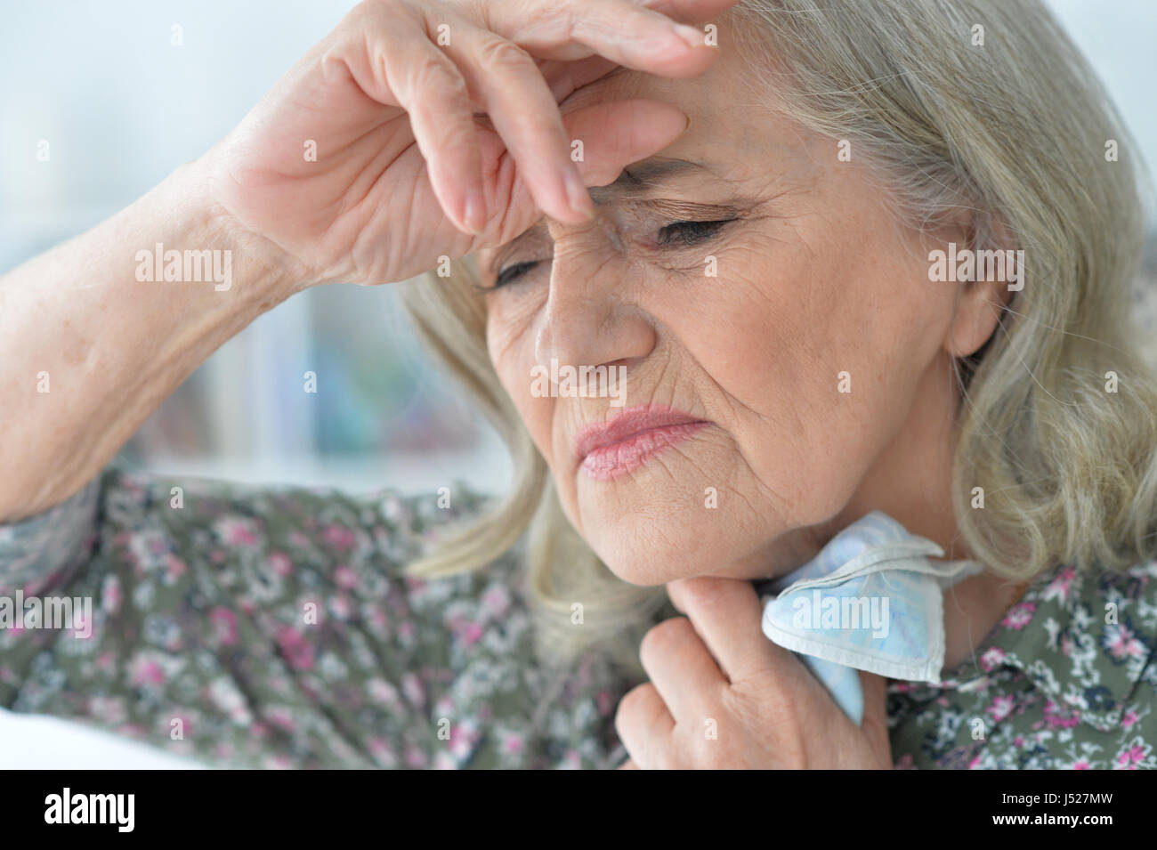 Beautiful sad elderly woman Stock Photo - Alamy