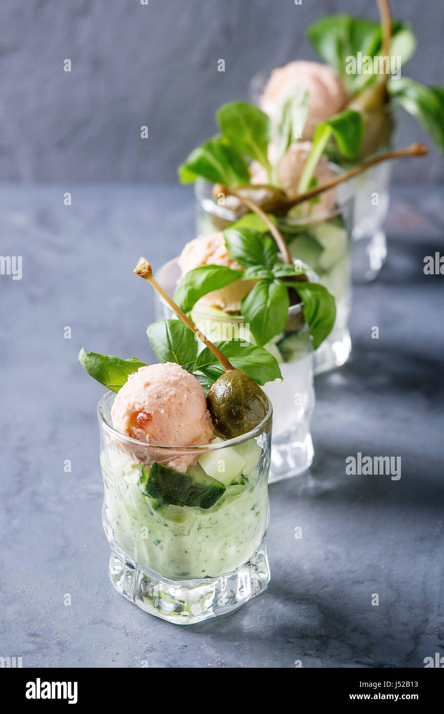 Verrines appetizer with salmon pate, red caviar, cucumber, cream cheese ...