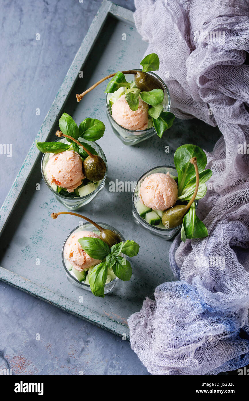 Verrines appetizer with salmon pate, red caviar, cucumber, cream cheese ...