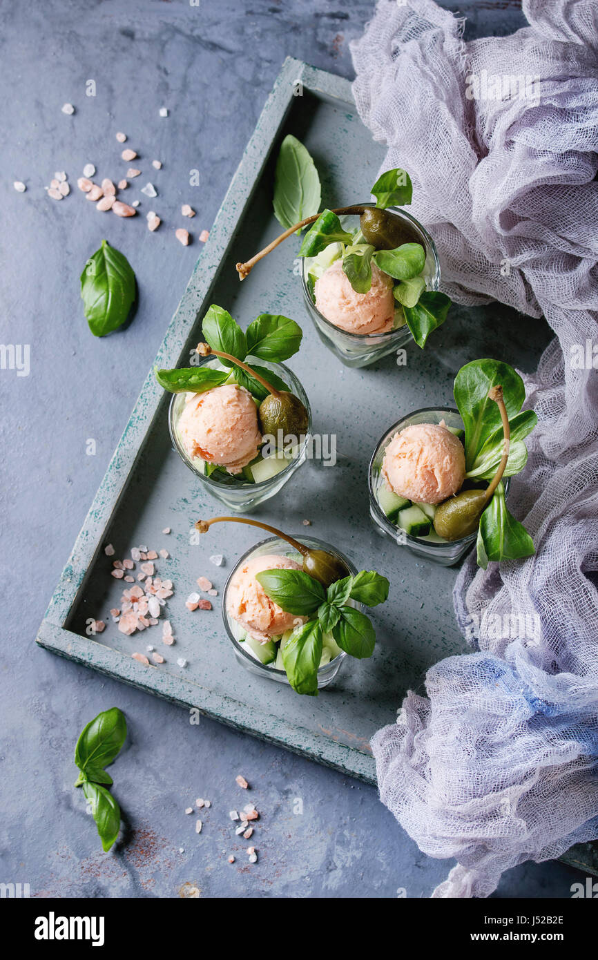 Verrines appetizer with salmon pate, red caviar, cucumber, cream cheese ...