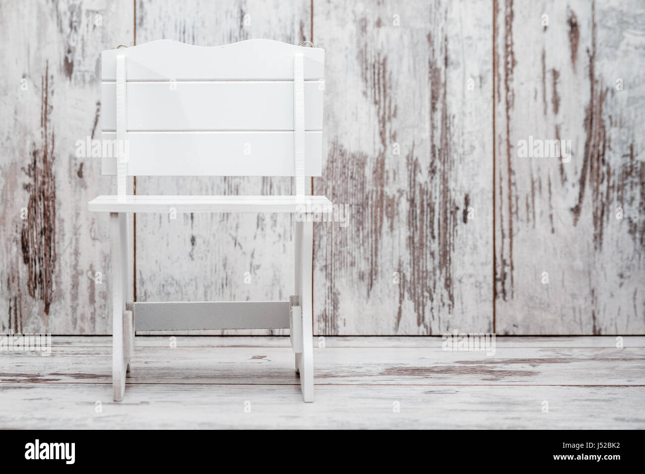 White wooden miniature bench on white wooden background Stock Photo - Alamy