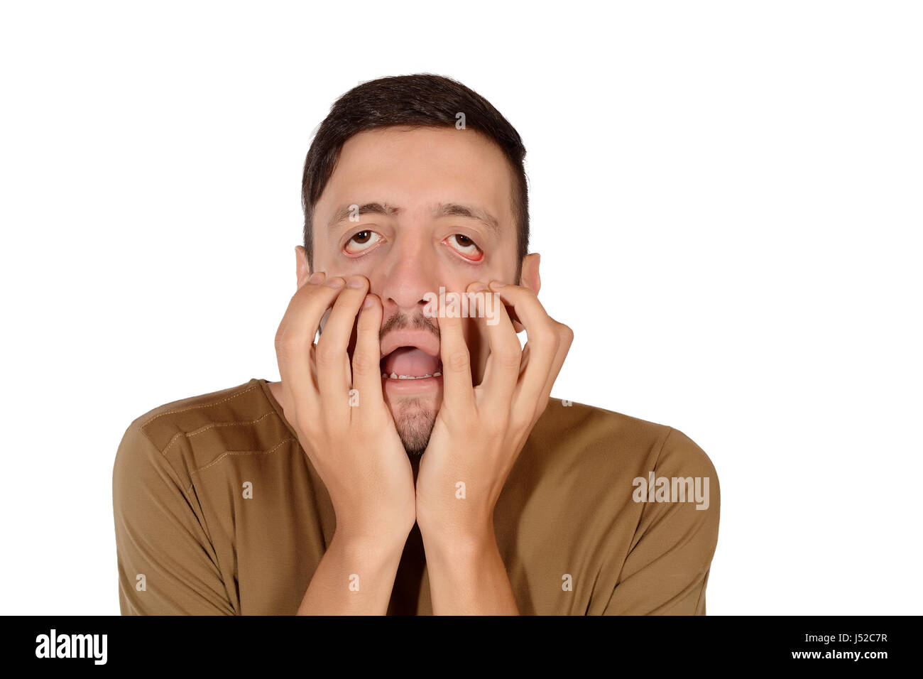Portrait of an exhausted man. Isolated white background Stock Photo - Alamy