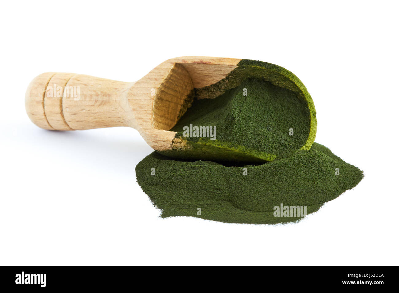 Chlorella algae powder with wooden scoop isolated on white background ...