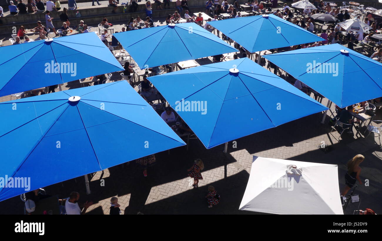 Large blue umbrellas on Brighton seafront, seen from above Stock Photo ...