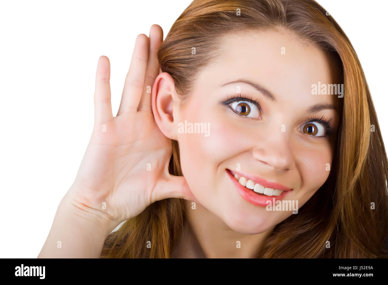 Woman with hand to ear listening isolated on white background Stock ...