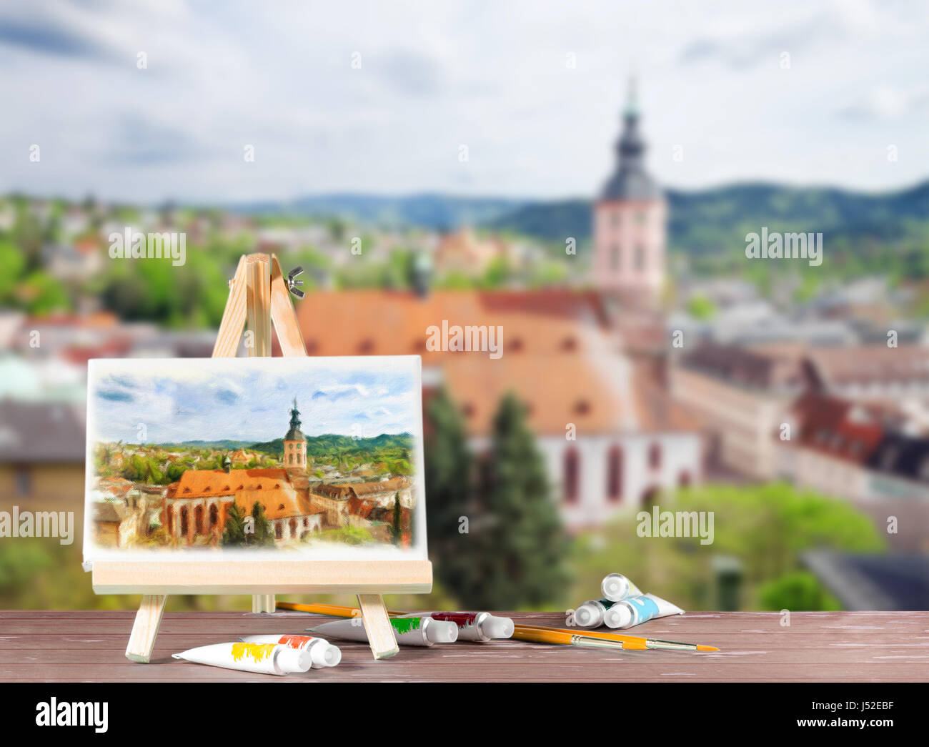 Easel with a watercolor painting with a view of Baden-Baden. Abstract ...
