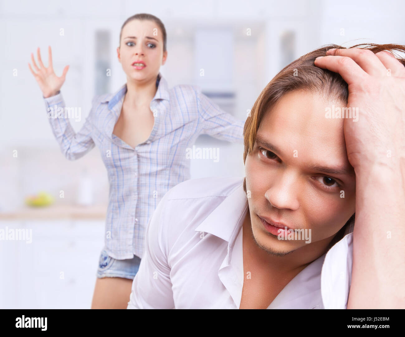 A young couple discovers the relationship on white background Stock ...