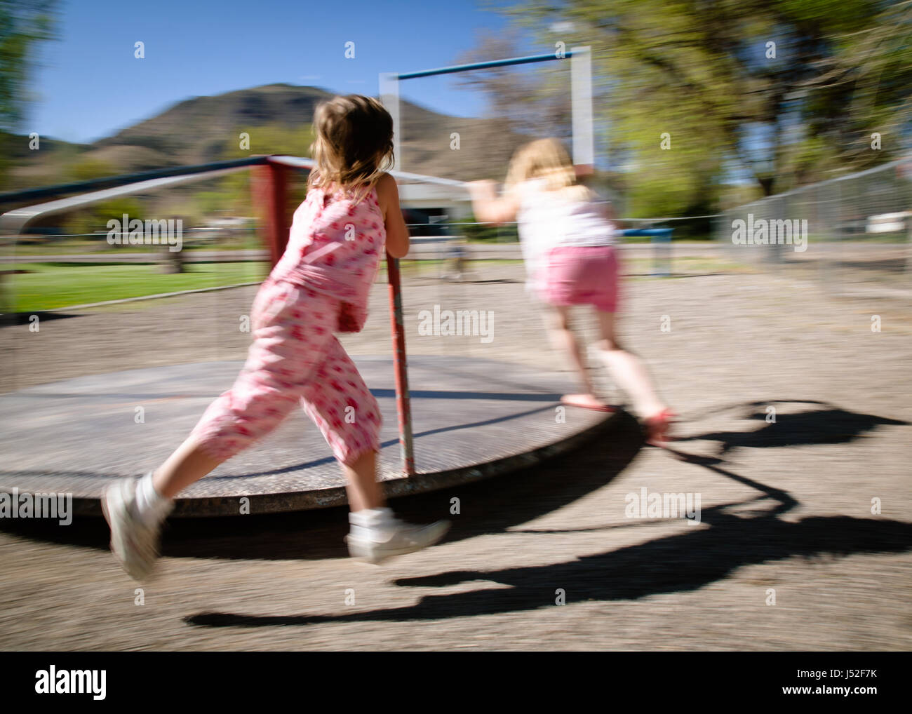 Kids playground playing roundabout kids playground playing roundabout ...