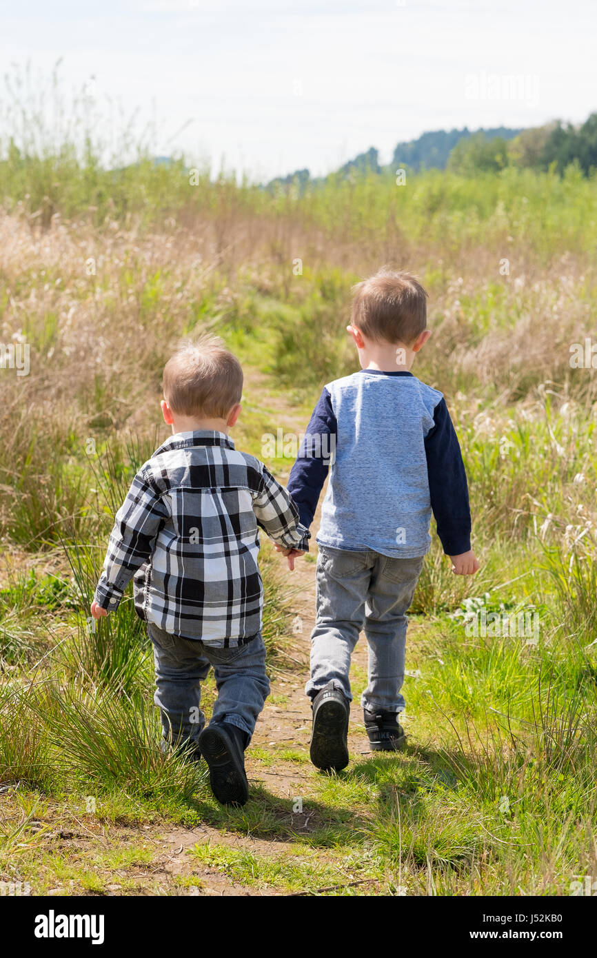 Brothers Playing Outdoors Stock Photo - Alamy