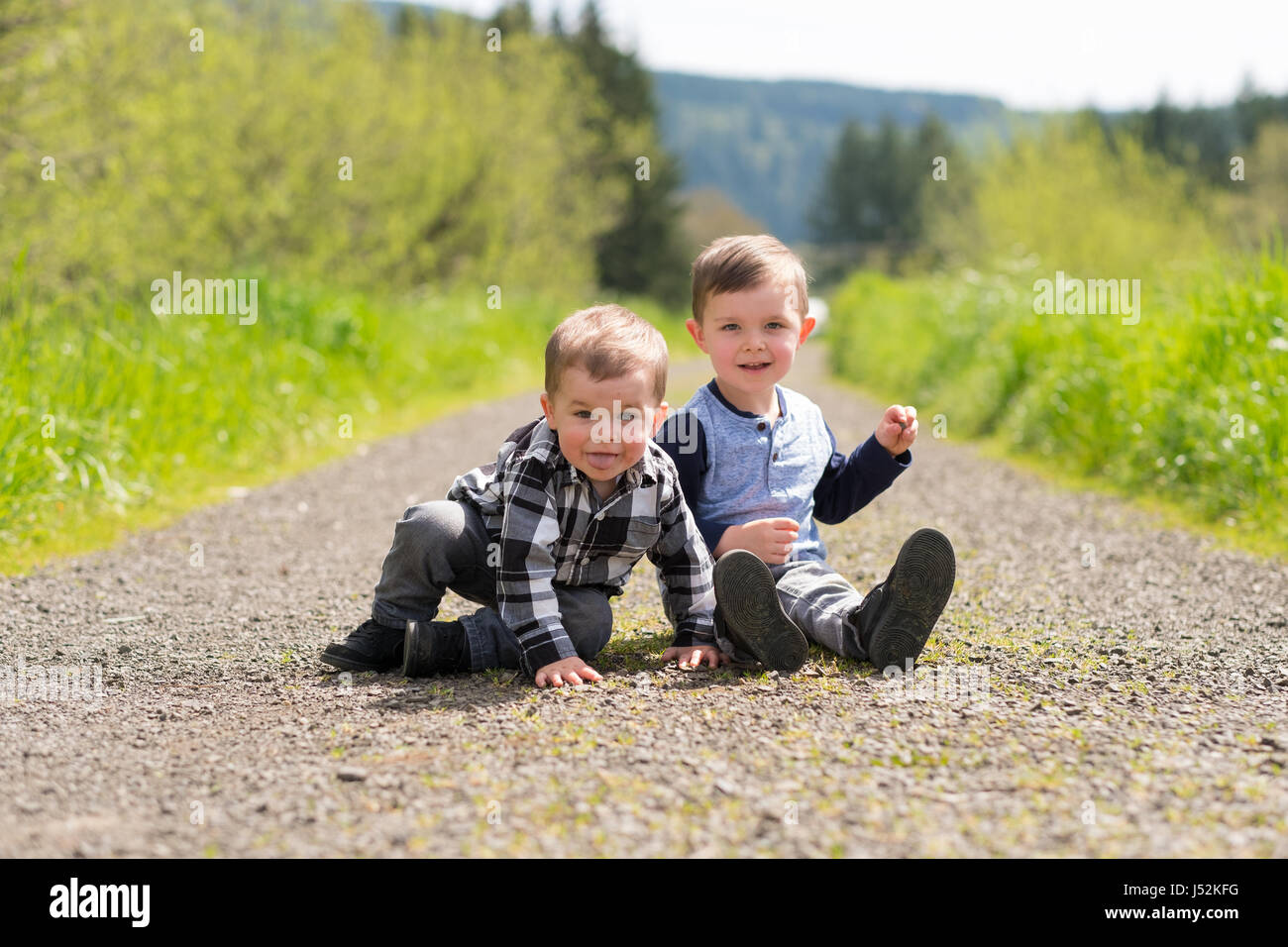 Brothers Playing Outdoors Stock Photo - Alamy