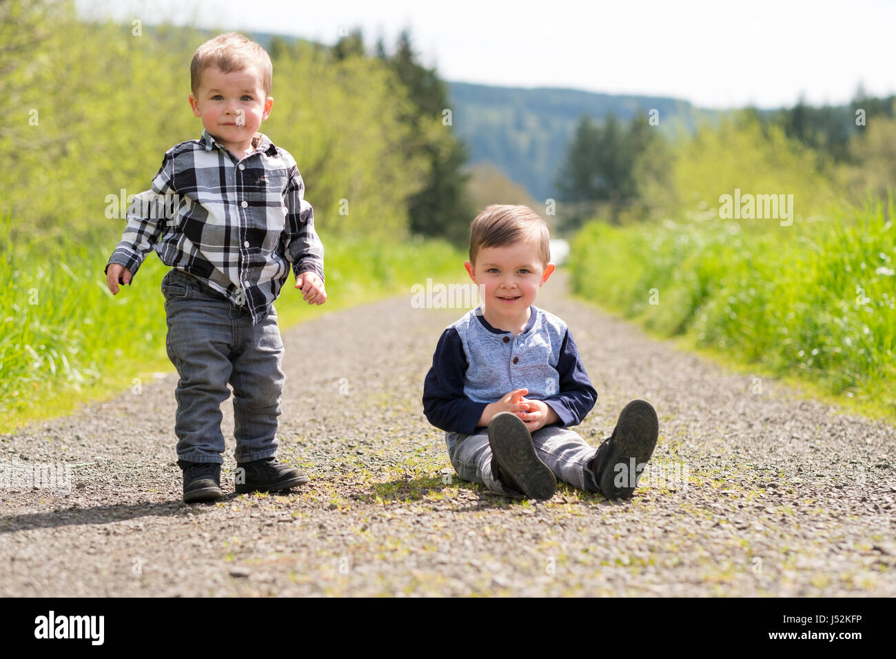 Brothers Playing Outdoors Stock Photo - Alamy