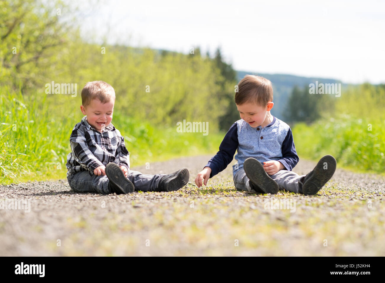 Brothers Playing Outdoors Stock Photo - Alamy