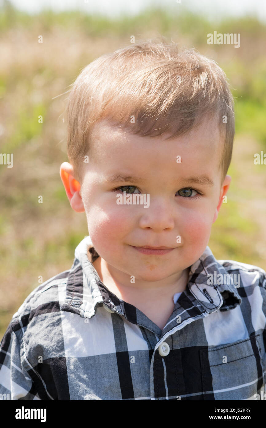 Lifestyle Portrait Young Boy Outdoors Stock Photo - Alamy