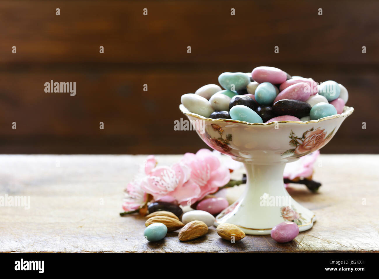 Candies almonds in sugar colored glaze Stock Photo - Alamy