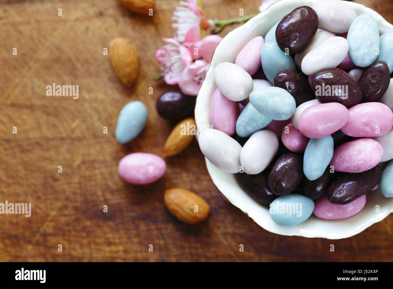 Candies almonds in sugar colored glaze Stock Photo - Alamy