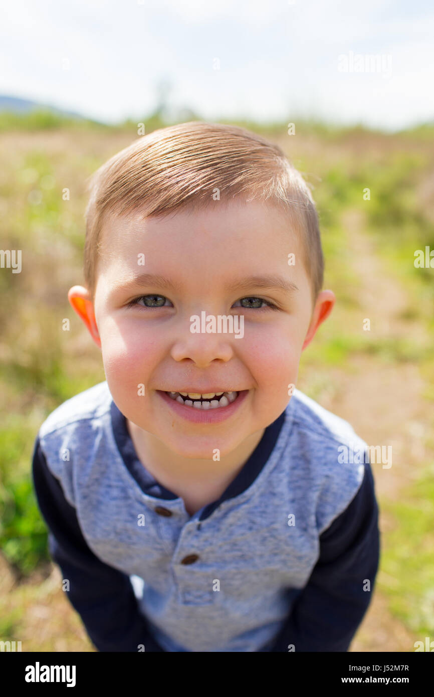 Lifestyle Portrait Young Boy Outdoors Stock Photo - Alamy