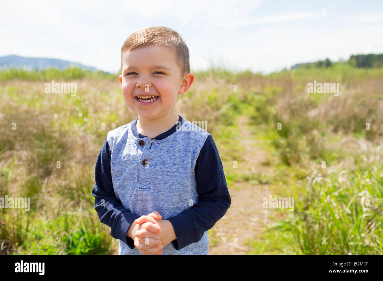 Lifestyle Portrait Young Boy Outdoors Stock Photo - Alamy