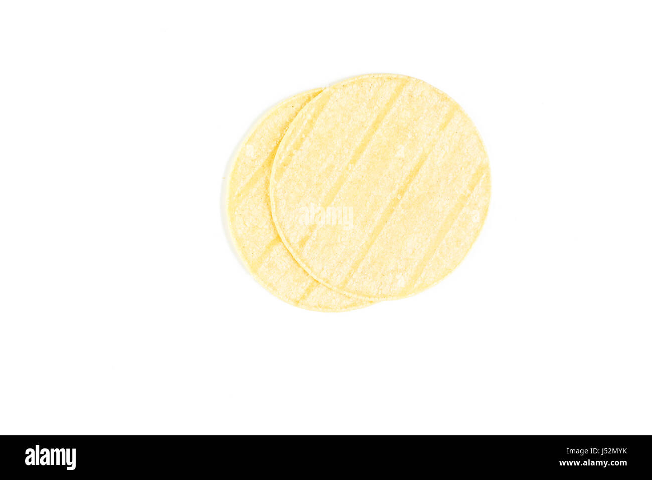 Fresh yellow corn tortillas on a white background Stock Photo - Alamy