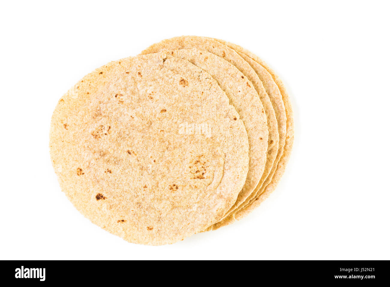 Fresh multi-grain tortillas on a white background Stock Photo - Alamy