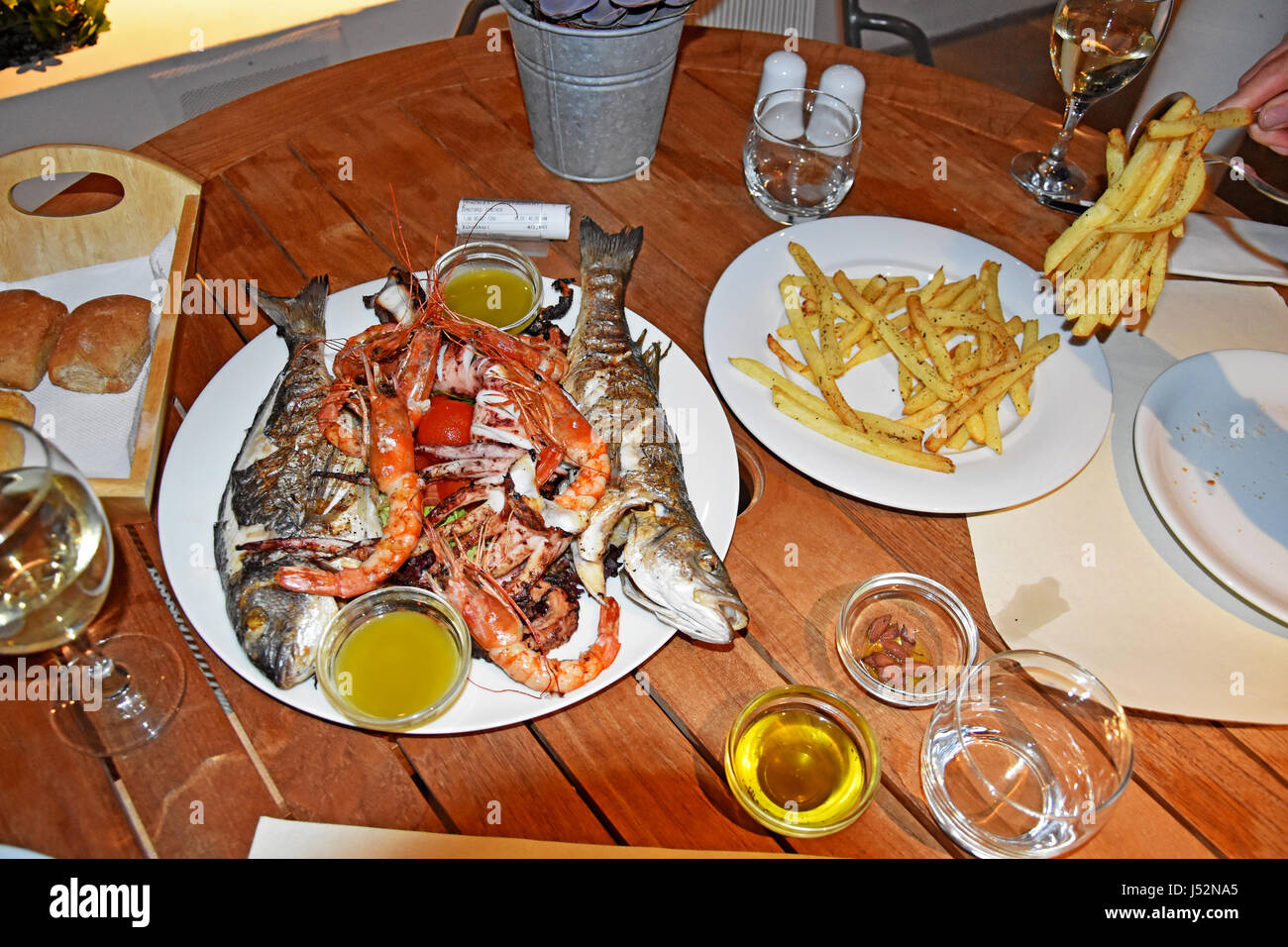 Selection of seafood served in a greek hotel Stock Photo - Alamy