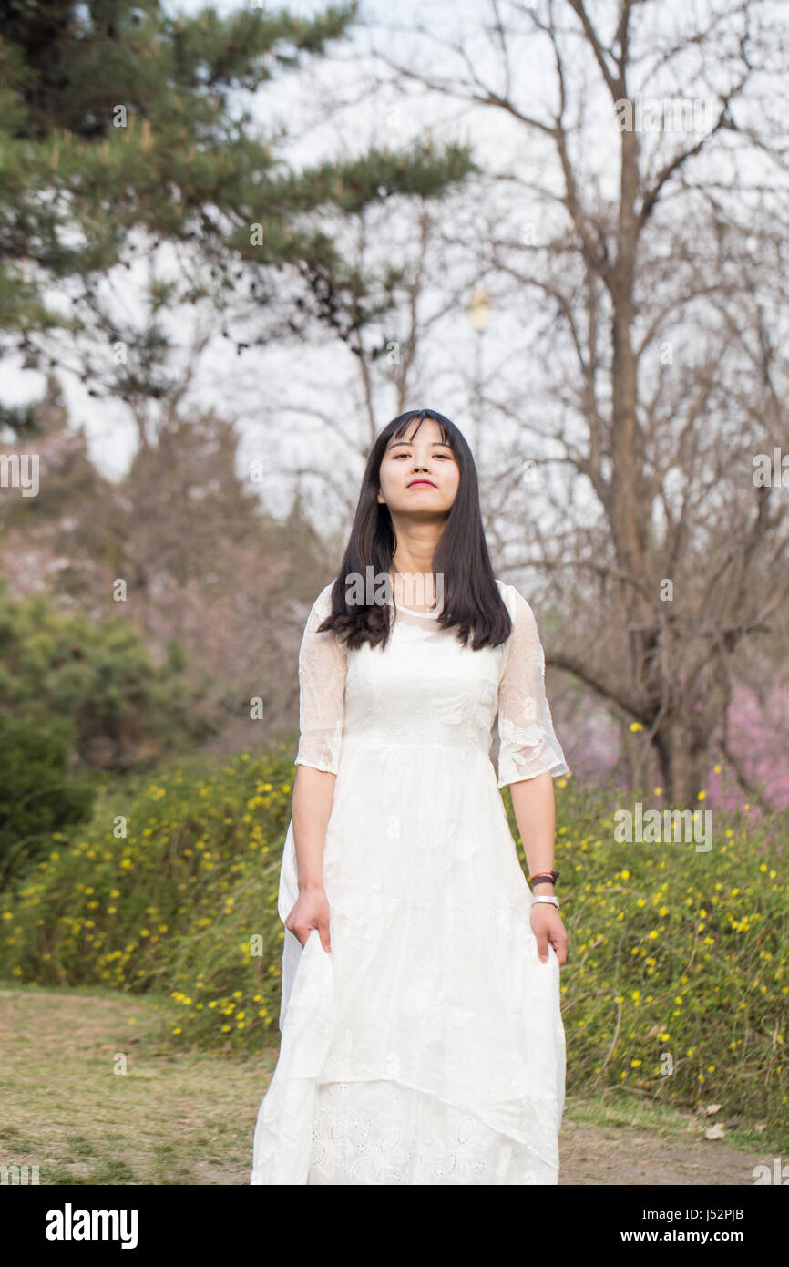 Beautiful girl in spring time. Smiling, Asia, Outdoors, Springtime ...