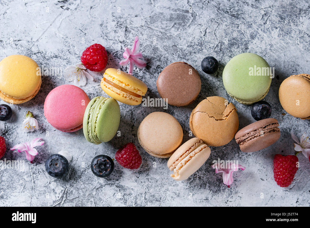 Variety of colorful french sweet dessert macarons with different ...