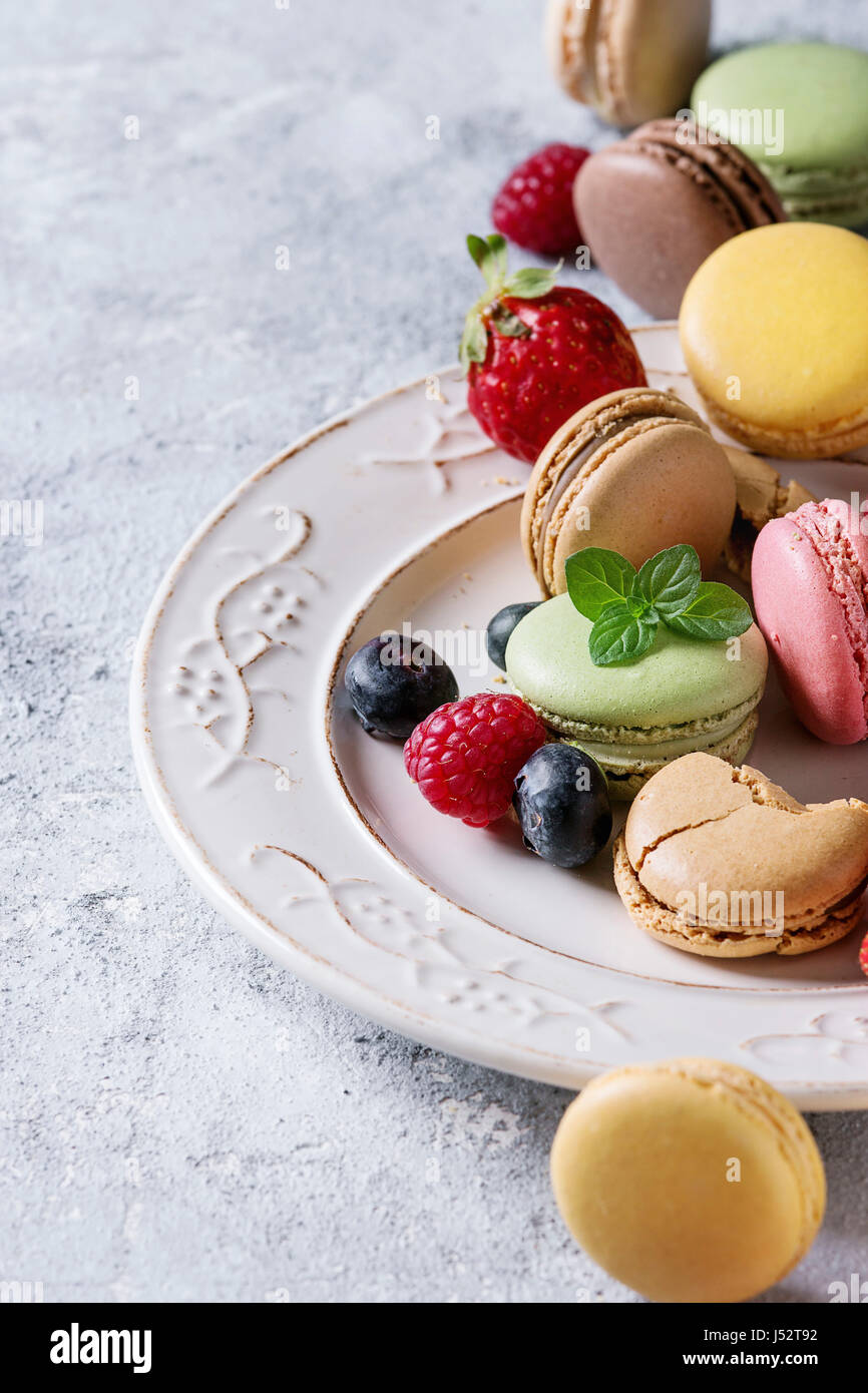 Variety of colorful french sweet dessert macarons with different ...