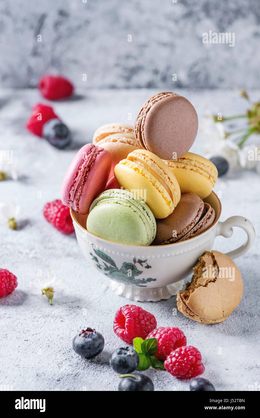 Variety of colorful french sweet dessert macarons with different ...