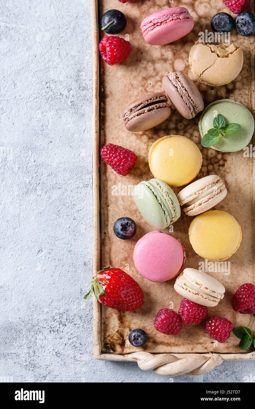 Variety of colorful french sweet dessert macarons with different ...