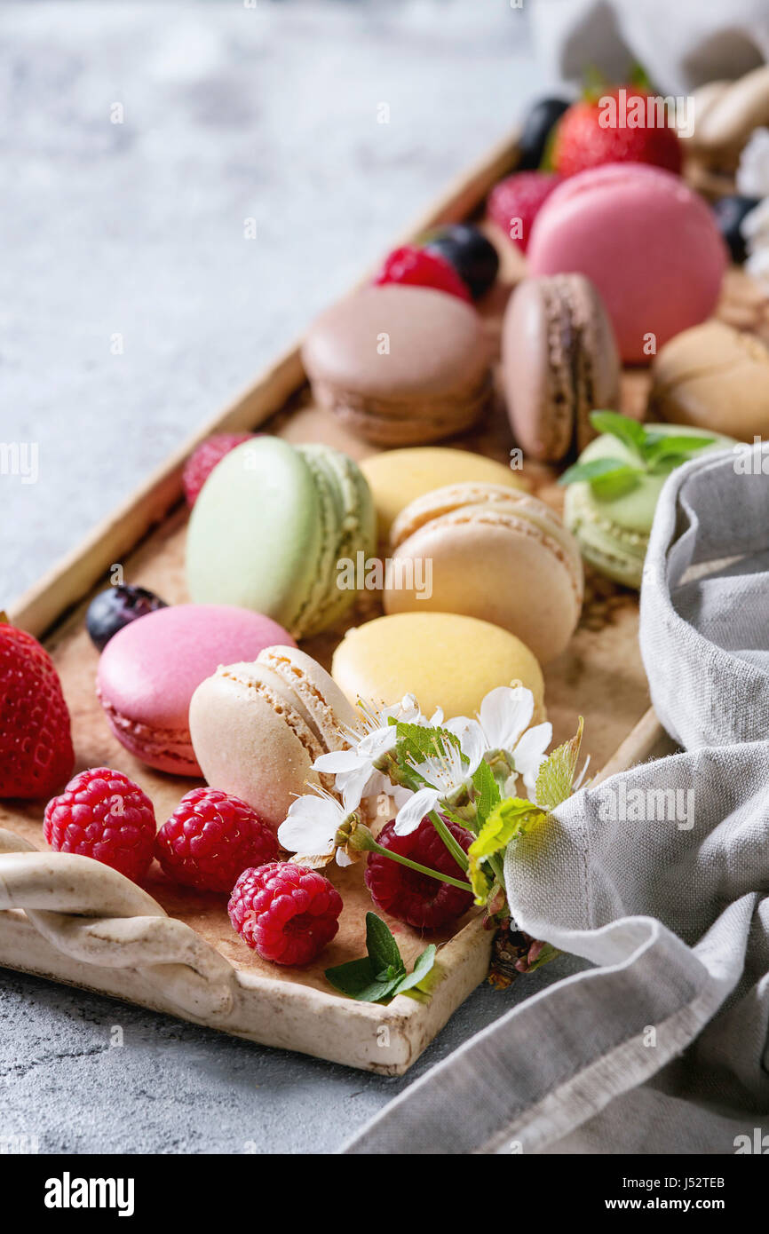 Variety of colorful french sweet dessert macarons with different ...