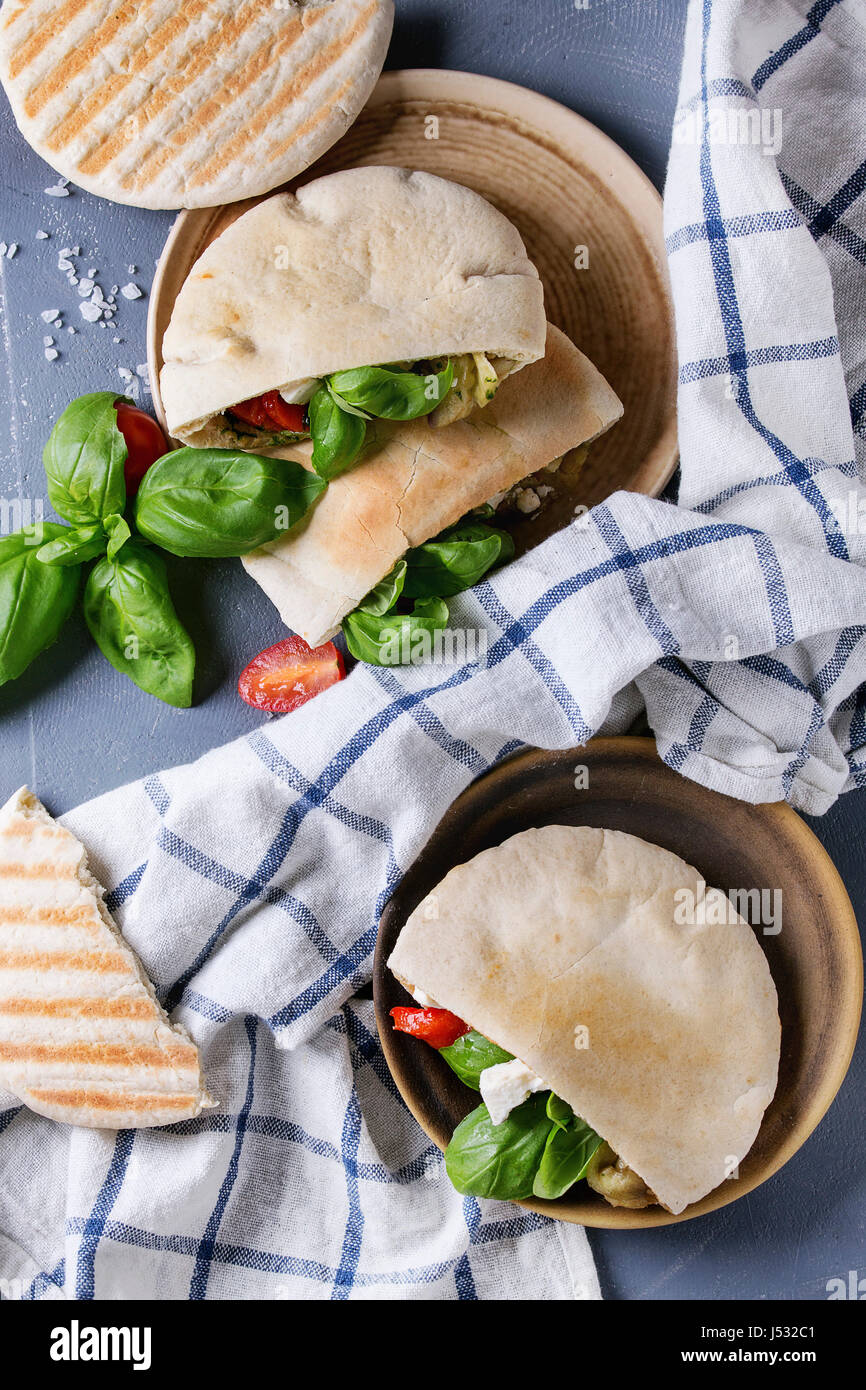Pita bread sandwiches with grilled vegetables paprika, eggplant, tomato ...