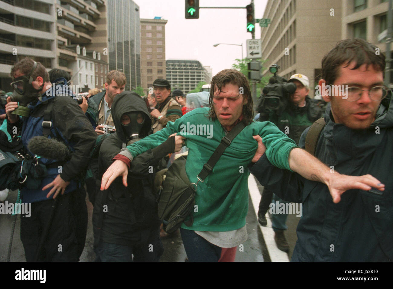 Street medics helping protester who was sprayed. Protesters block ...