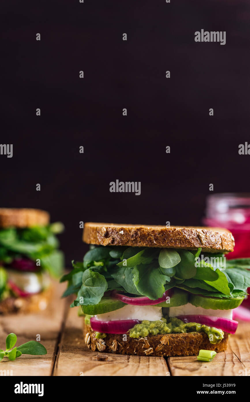 Springtime feta sandwiches with avocado, pickled red onions and herbs ...
