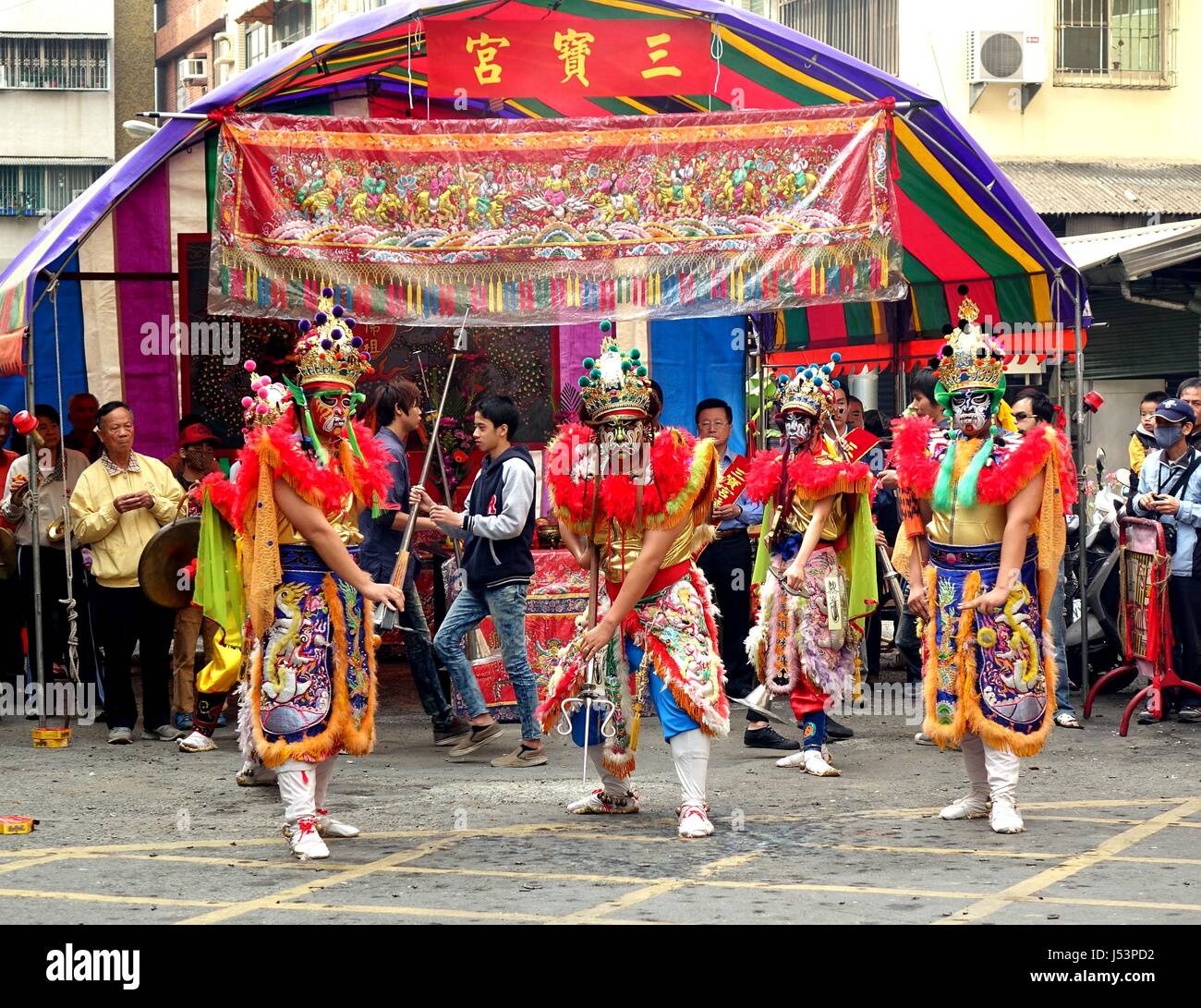KAOHSIUNG, TAIWAN -- MARCH 16, 2014: Three young men with painted ...