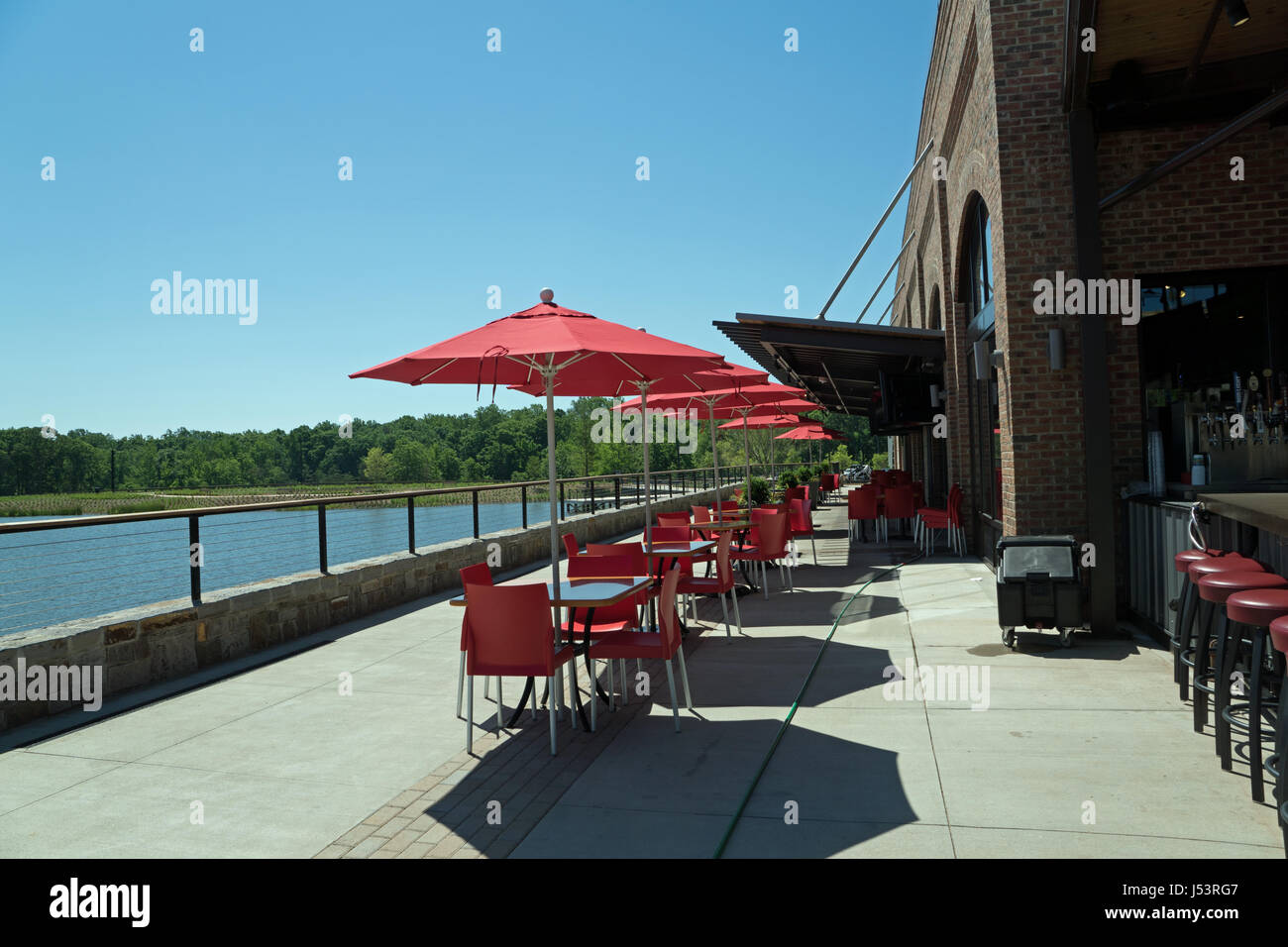 Restaurant patio overlooking waterfront Stock Photo - Alamy