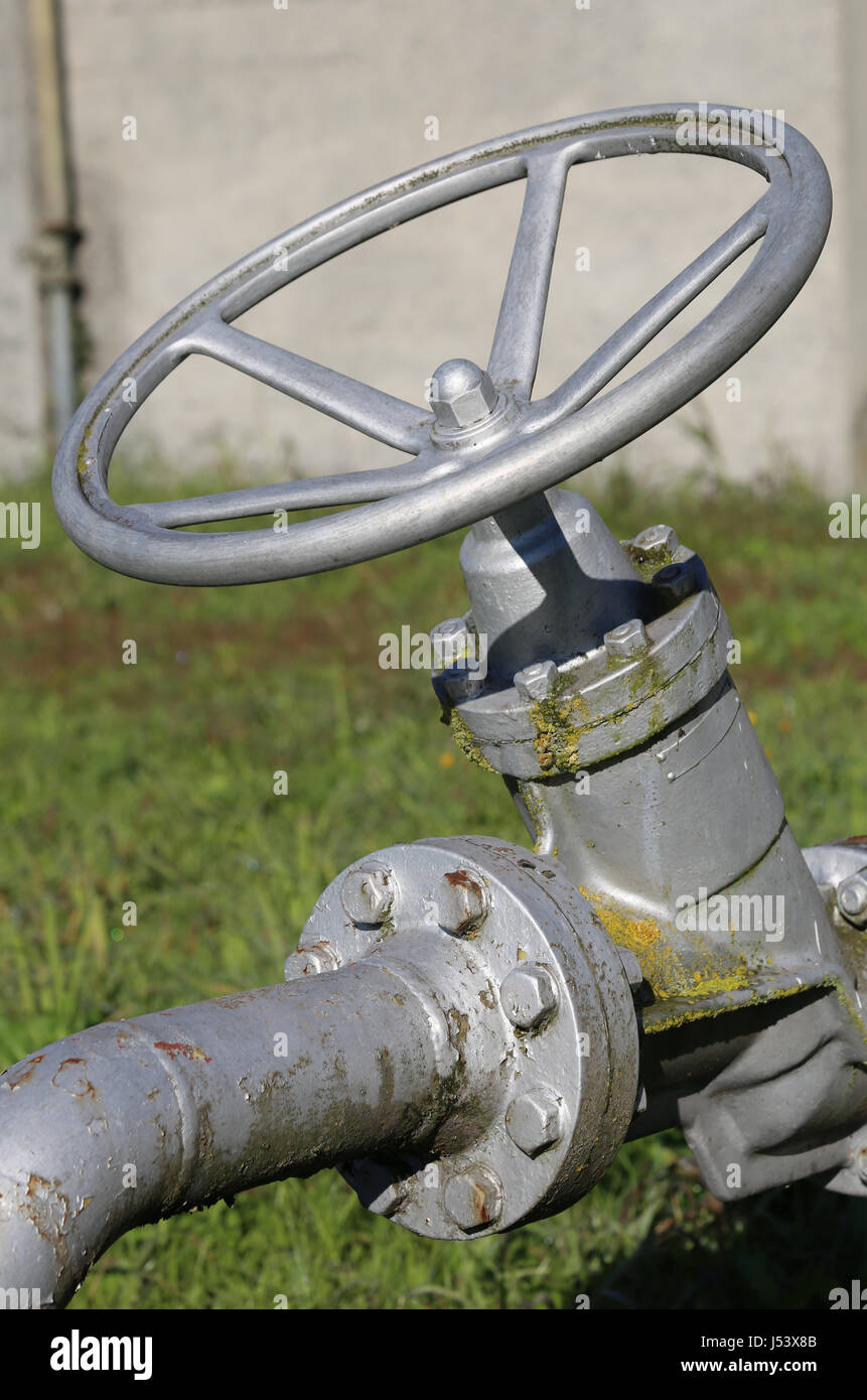 tap with pipe closure valve in a large industrial plant Stock Photo - Alamy